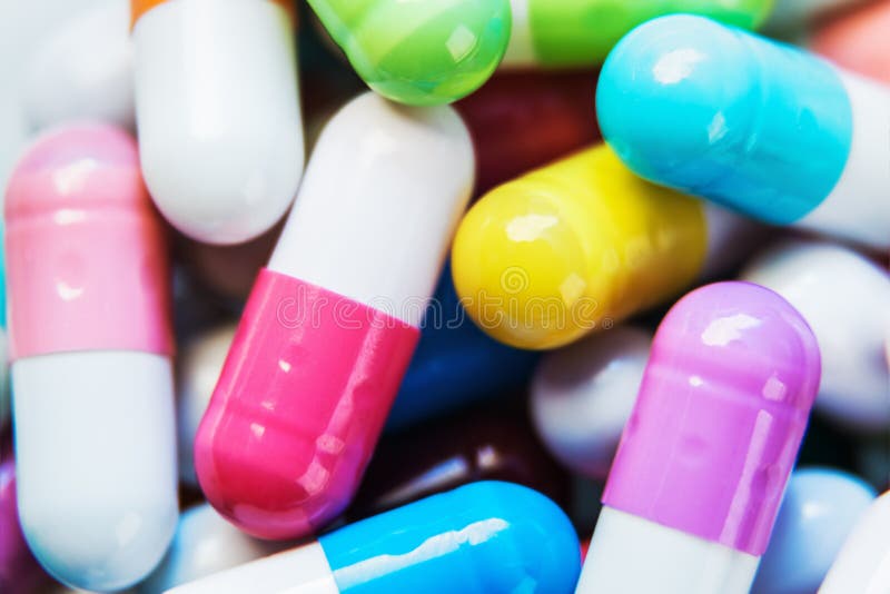 Pills of Different Colors Background Stock Photo - Image of medication ...