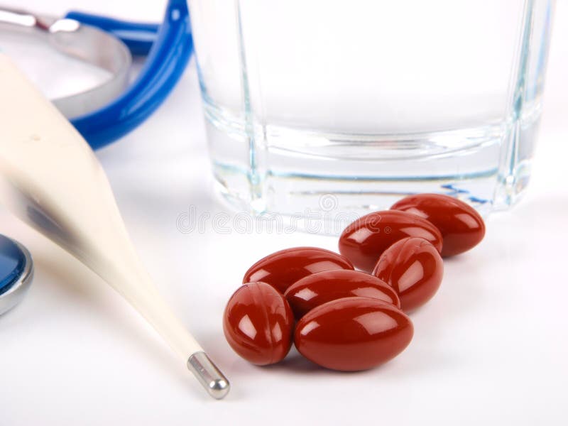 Pills on doctors table stock image. Image of vitamin - 12582747