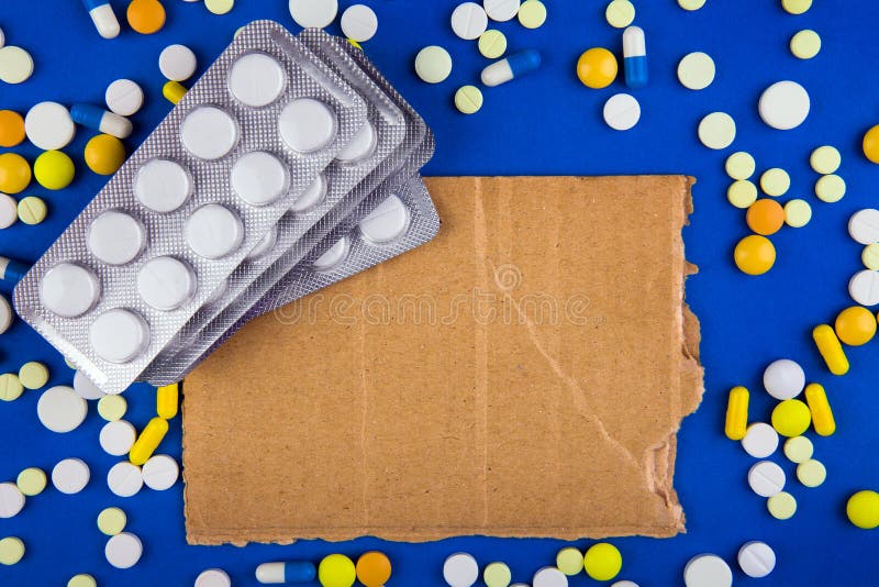 Cardboard with a Pills stock image. Image of medical - 133937817