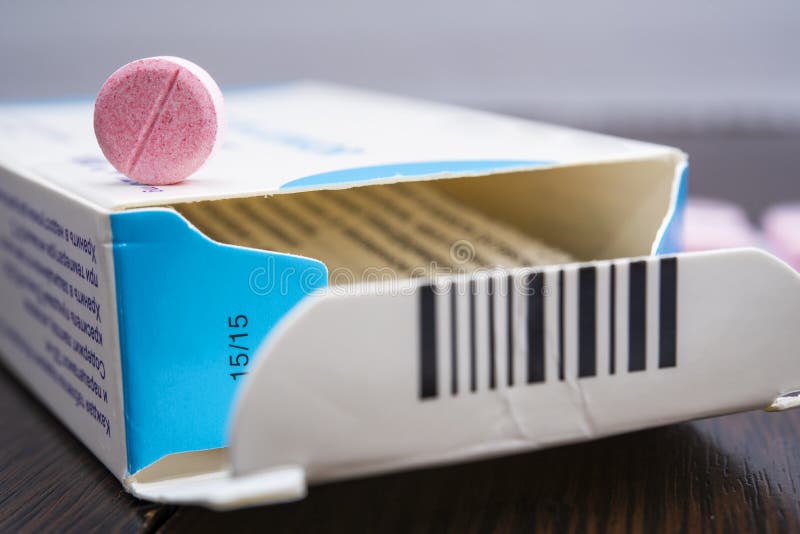 Pink Pill and First Aid Kit in a Blue Box Stock Photo - Image of ...