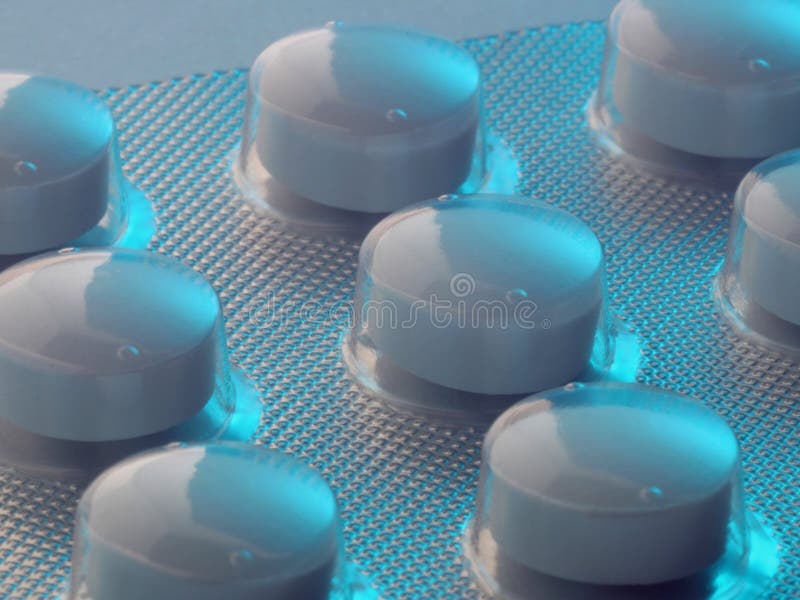 Pills in foil wrapping stock image. Image of drugs, remedy - 77087