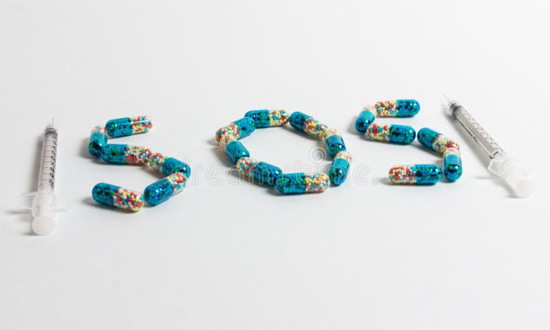 Pills forming word SOS stock image. Image of mayday, drugs - 5719005