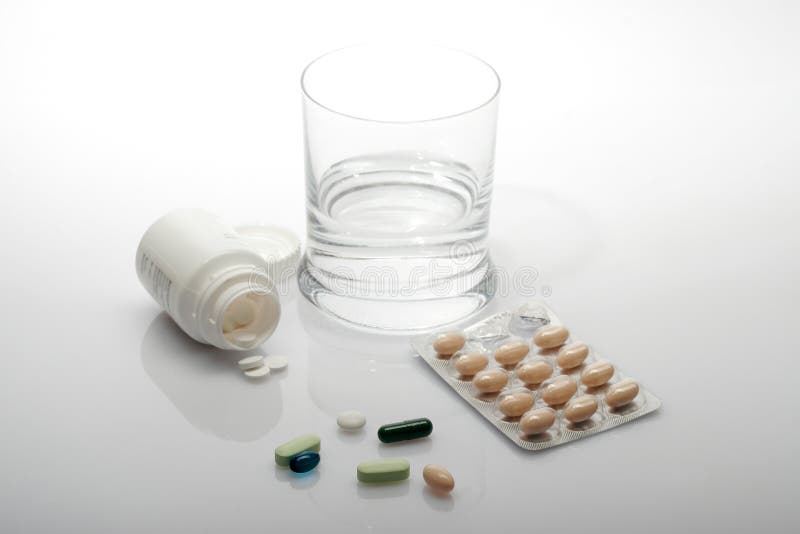 Glass of Water and Four Pills Stock Image - Image of globular, diabetes ...