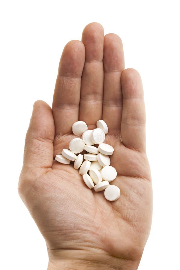 Pills in Hand stock photo. Image of supplement, white - 12420576