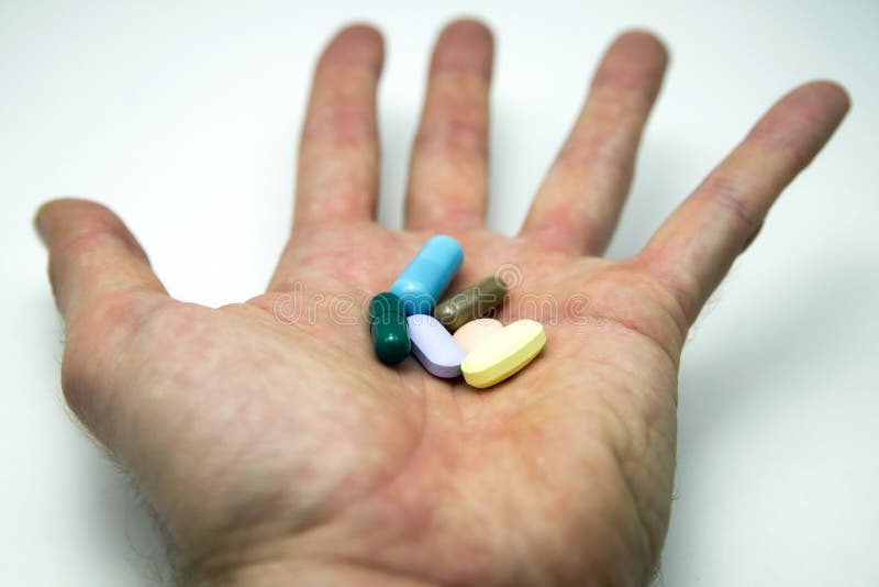 Pills in hand stock photo. Image of human, hand, modern - 89071350
