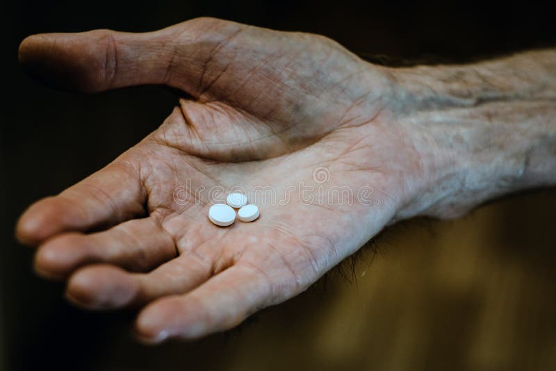 Pills in hand stock image. Image of pain, holds, person - 136057207