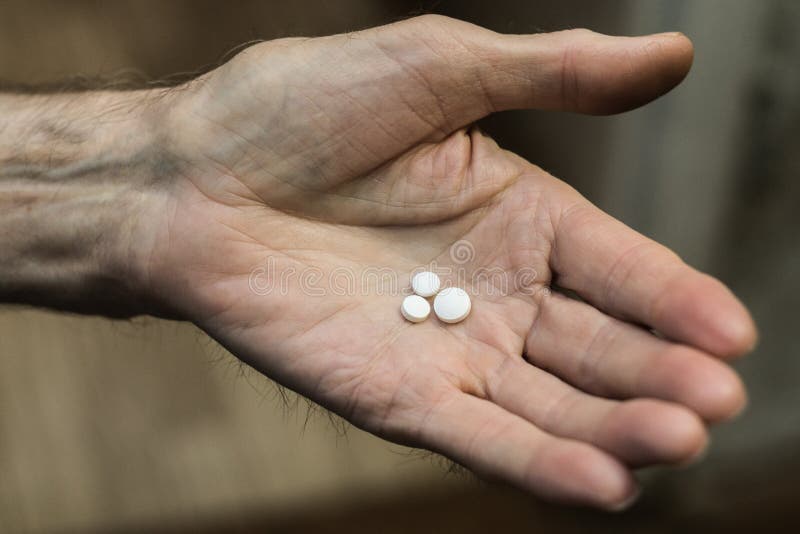 Pills in hand stock image. Image of tablet, alzheimer - 137202371