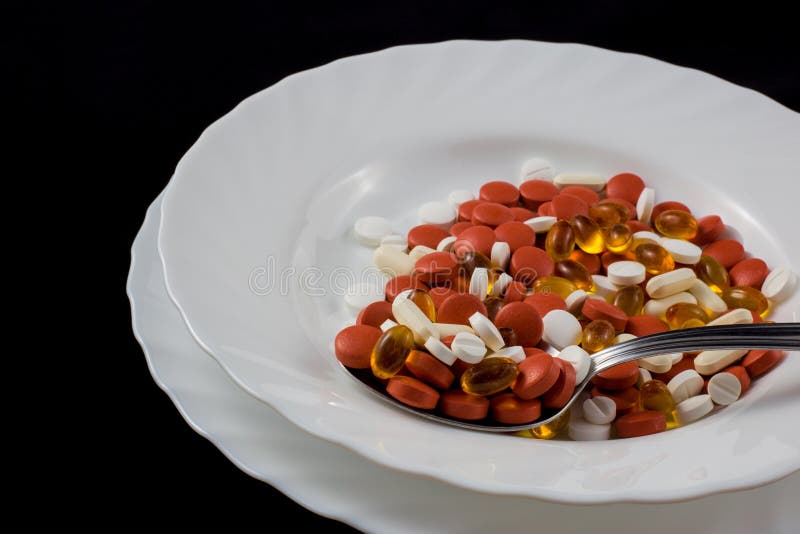 Pills at lunch stock photo. Image of medicine, care, kitchen - 93221972