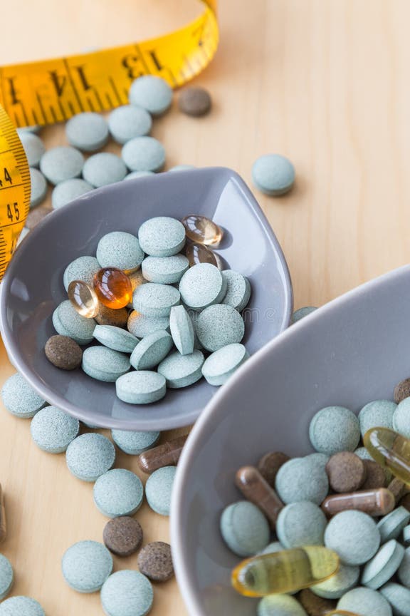 Pills and multivitamins stock image. Image of protein - 71200405