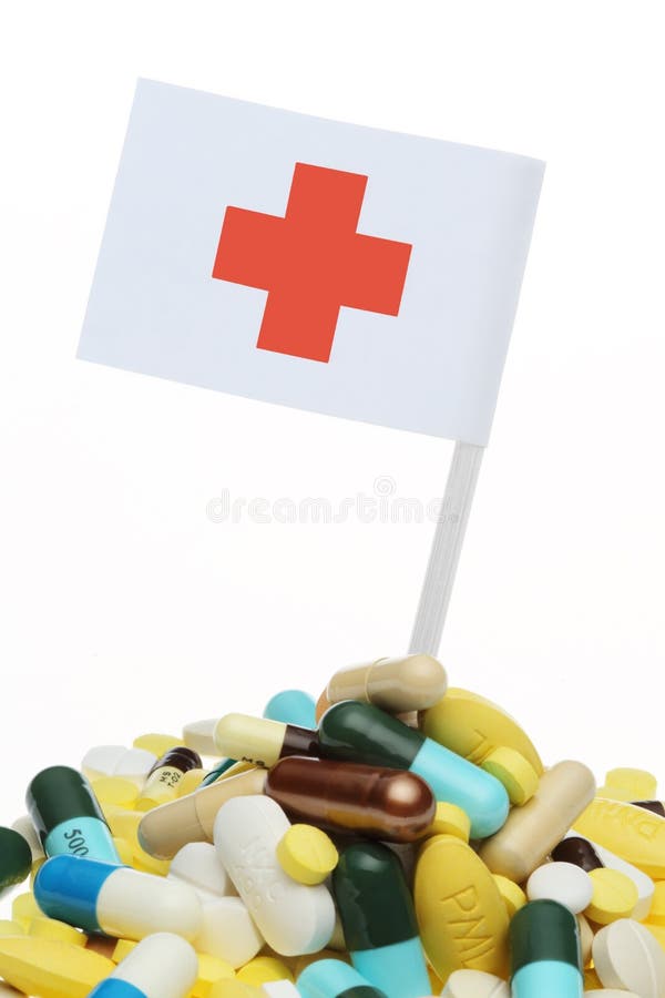 Pills and red cross flag editorial photo. Image of medicine - 38912066