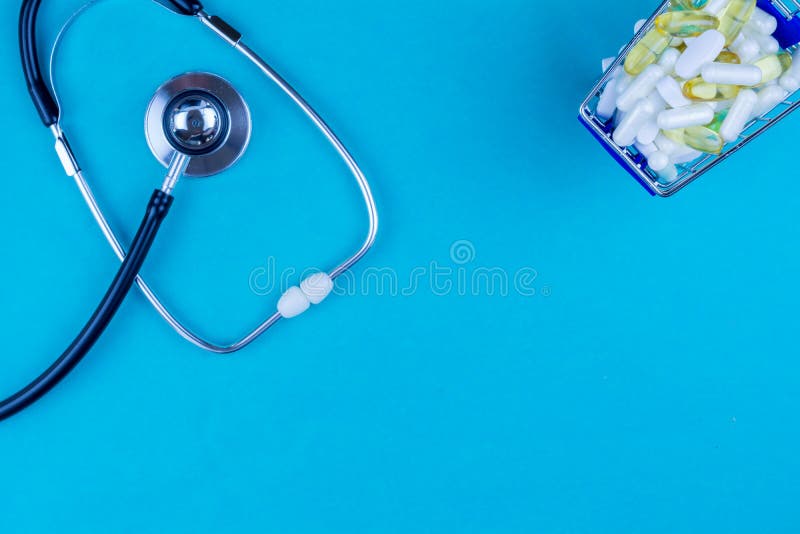 Pills And Stethoscope On Medical Desk Flat Lay Blue Stock Photo - Image ...