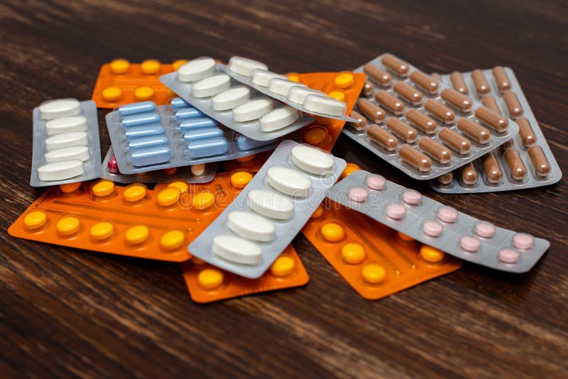The pills on the table stock photo. Image of background - 176595782