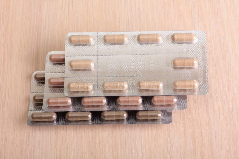 Pills on table stock image. Image of pharmacy, cure, healthy - 76960037