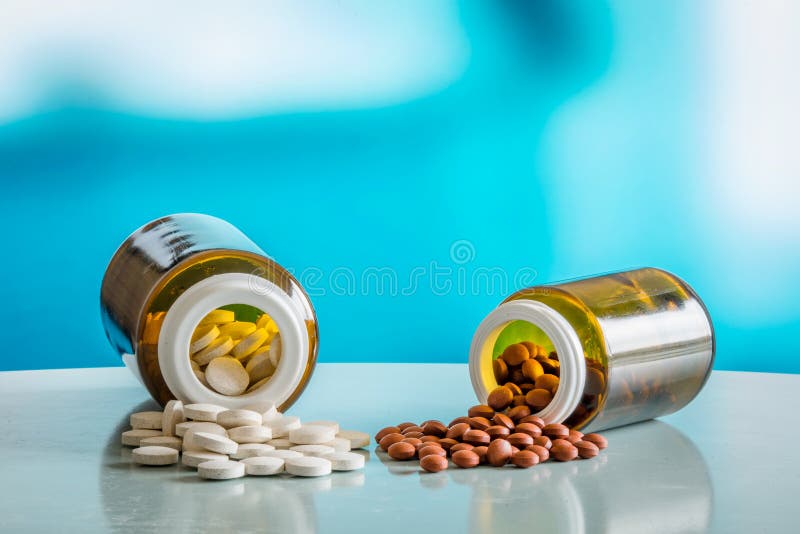 Pills on a Table with Two Glasses Stock Photo - Image of glass, concept ...