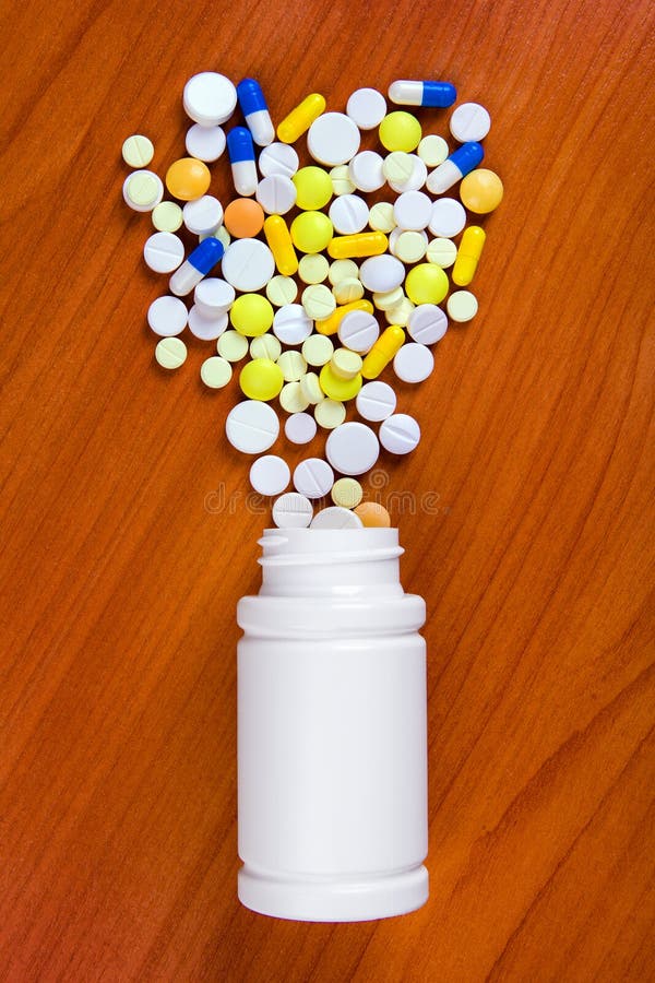 Pills on the Table stock photo. Image of treatment, pills - 131311434