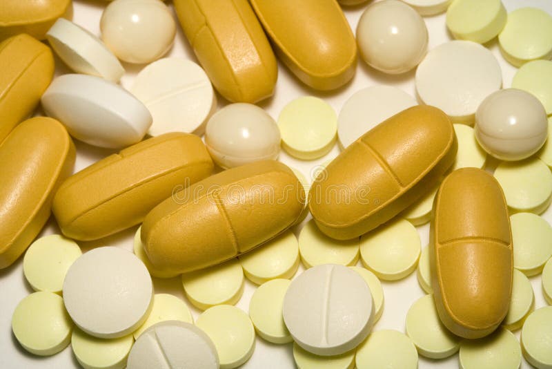 Yellow Pills Background stock image. Image of encased - 5720219