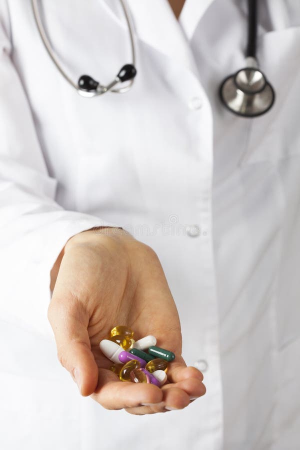 Pills vs. vitamins stock image. Image of ache, drugs - 27545917