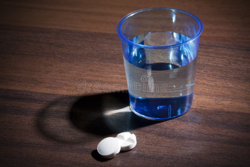 Pills and water stock photo. Image of headache, tablet - 15472346