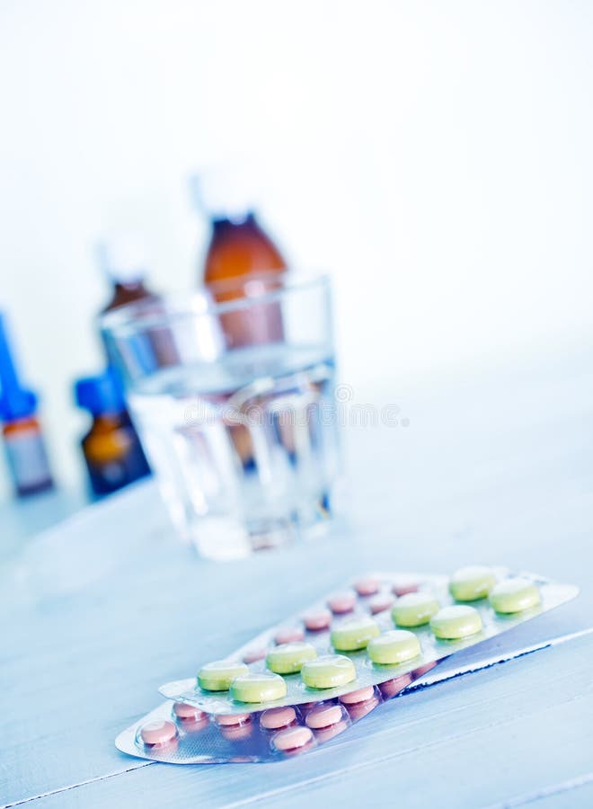 Pills and water stock image. Image of medication, cure - 46917863