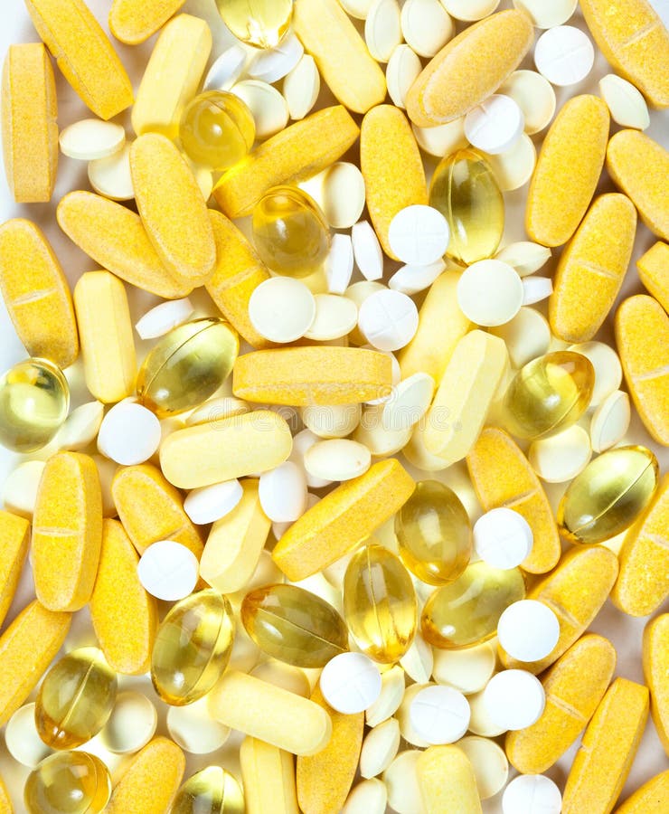 Les Pilules Jaunes Se Renversant Ou Versent Hors De La Bouteille De ...