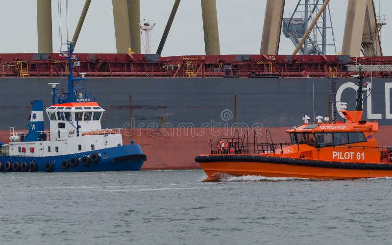 Pilot Boat and Tug in Swinoujscie Editorial Photo - Image of terminal ...