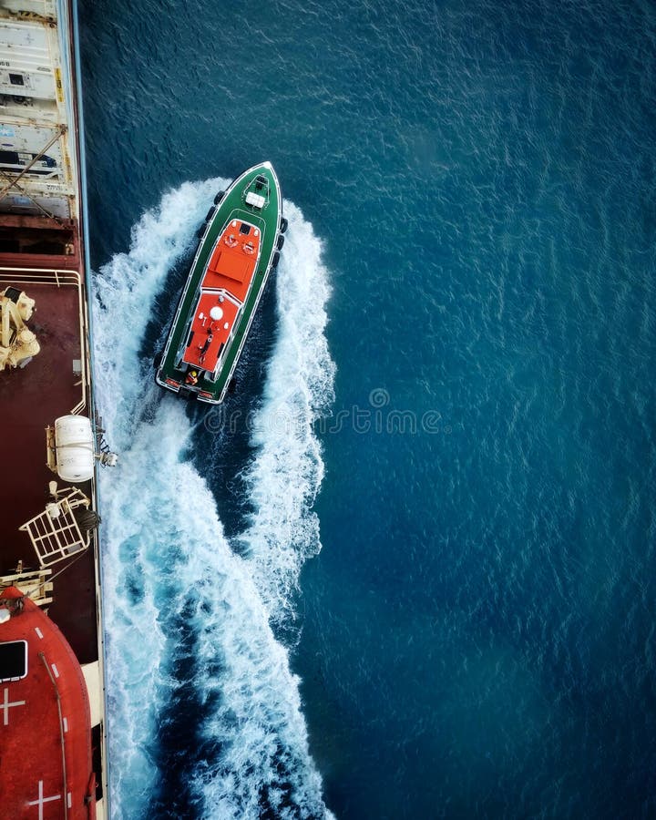 Pilot Boat by the Container Ship Side Stock Image - Image of boat ...