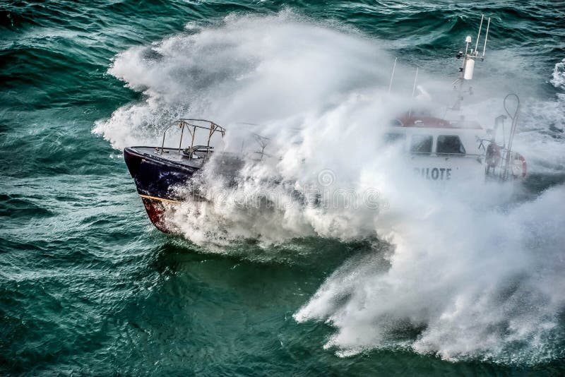 Pilot Boat Seen from the Sky Sailing in the Middle of a Storm Stock ...
