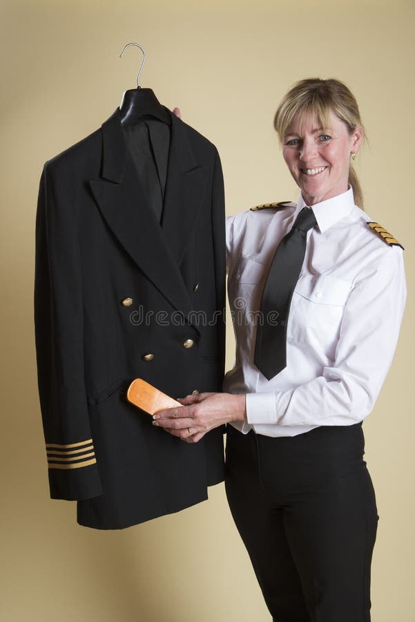 Pilot Brushing Uniform Jacket Stock Photo - Image of brush, clothes ...