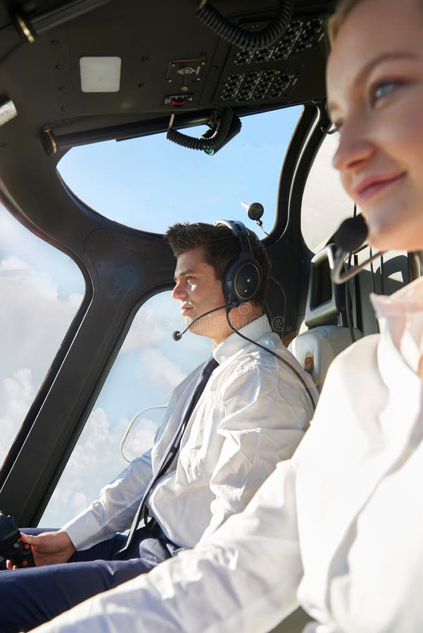 Pilot and Co Pilot in Cockpit of Helicopter Stock Photo - Image of ...