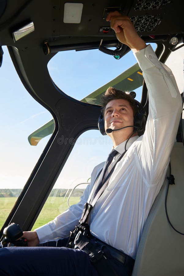Pilot in Cockpit of Helicopter before Take Off Stock Image - Image of ...