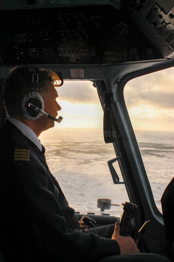 Male pilot in helicopter. stock image. Image of male, color - 6150177