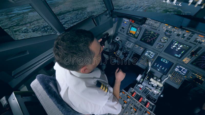 A Pilot is Sitting in Cropduster`s Cockpit, Winking and Closing the ...