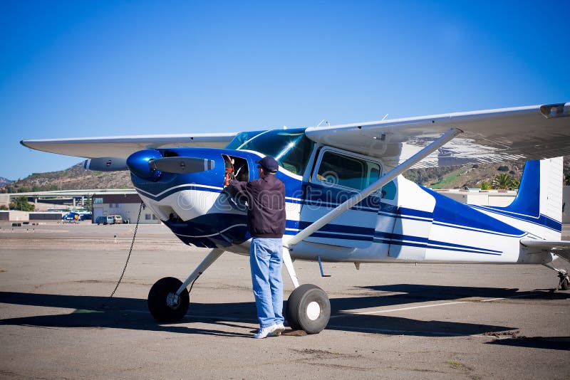 Pilot Doing Preflight of Light Aircraft Stock Image - Image of aircraft ...