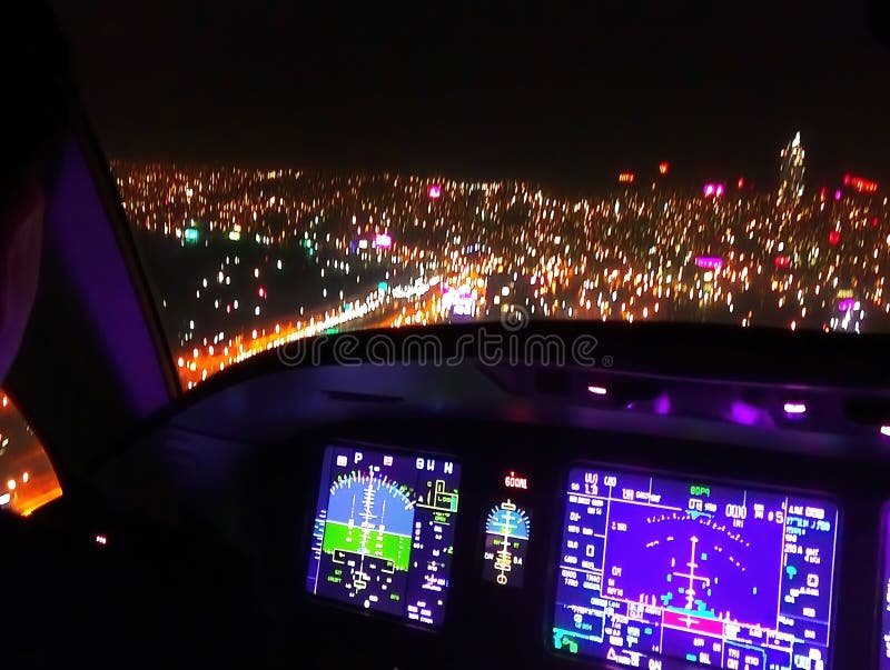 Pilot Flying Over City at Night: View from Airplane Cockpit Stock ...