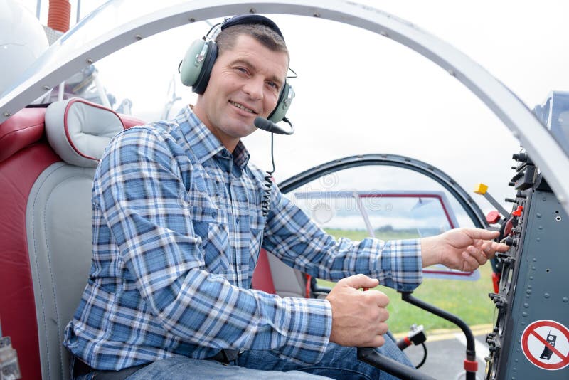 Pilot Posing Pressing Panel Buttons Stock Photo - Image of flying ...
