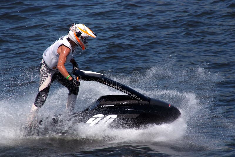 Pilot Riding Jet Ski during Competition on Water Splashes Editorial Photography - Image of ...