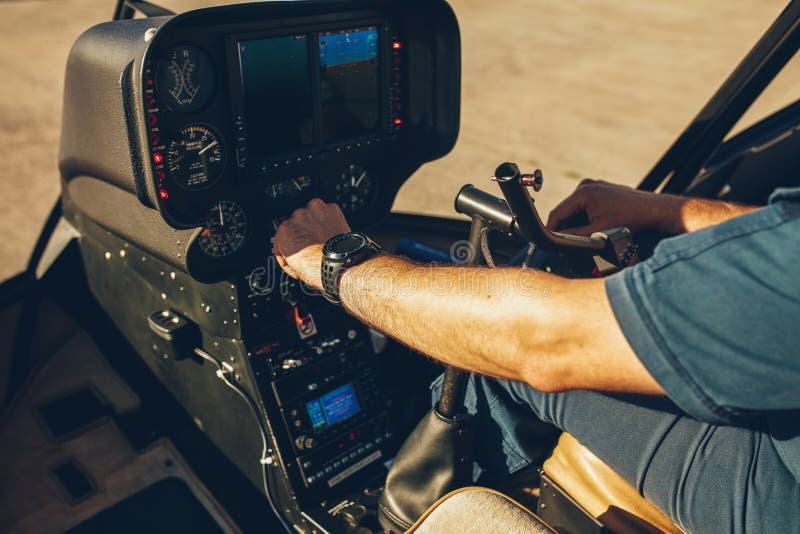 Pilot S Hand on an Helicopter Instrument Panel. Stock Photo - Image of ...