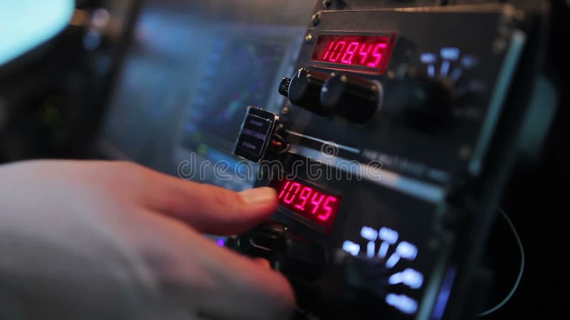 Pilot Searching Radio Frequency on Flight Panel of Airliner, Technology ...