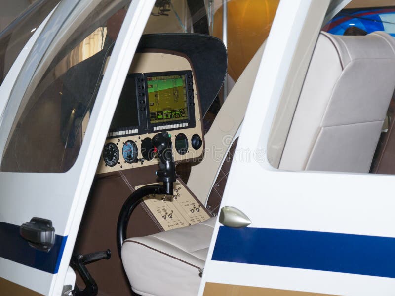 Pilot Seat in the White Cockpit of a Helicopter Stock Photo - Image of ...