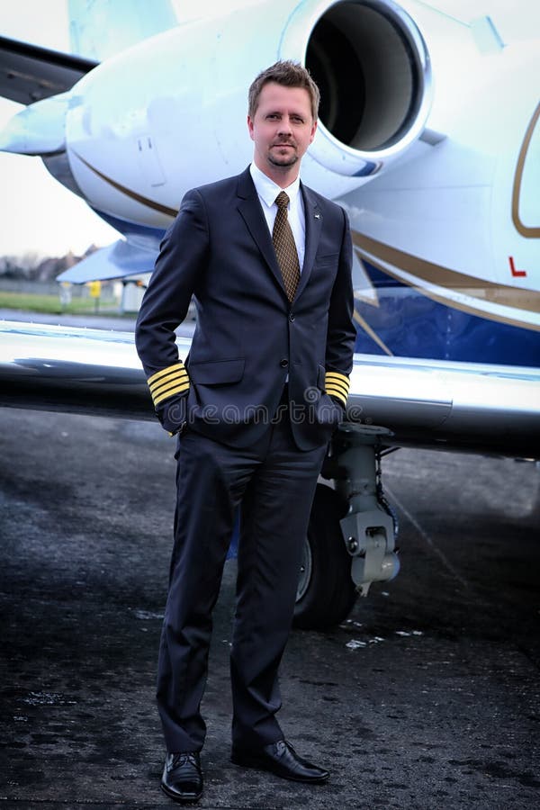 Pilot Standing by the Plane Stock Photo - Image of pilot, engine: 67041272