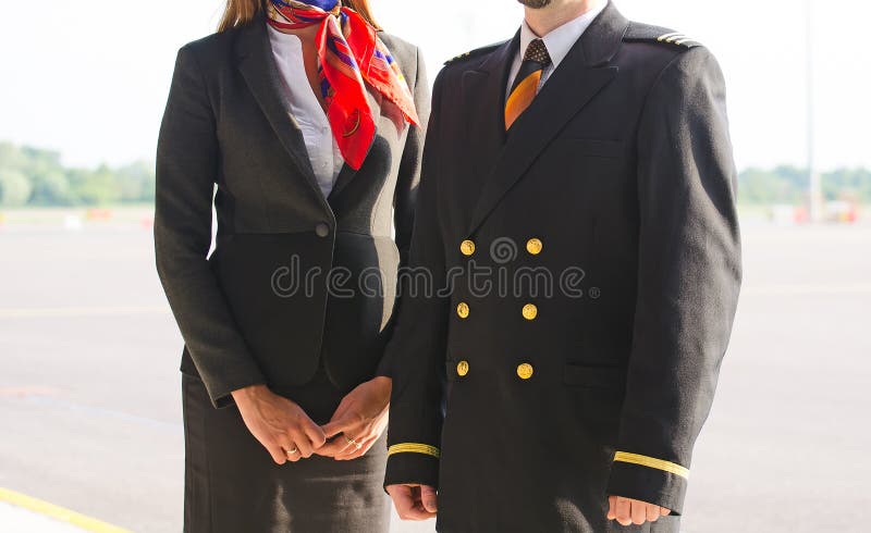 Pilot and stewardess. stock photo. Image of portrait - 42906028