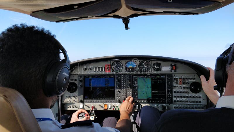 Pilot Student Selecting Autopilot Mode in DA42 Twin Engine Aircraft ...