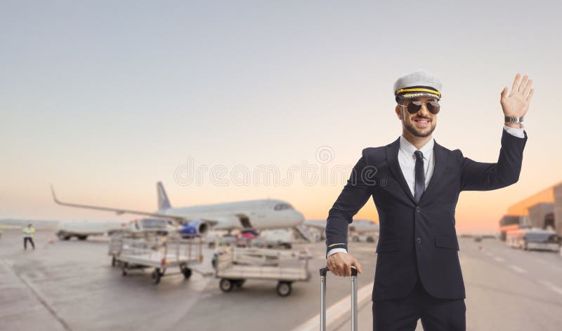 Pilot with a Suitcase Waving from an Airport Apron Stock Photo - Image ...