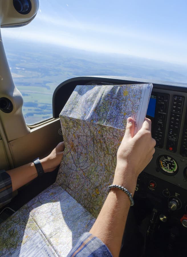 Pilot Using an Aviation Map for Navigation during Flight Stock Image ...