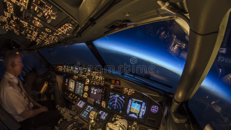 Pilot at Work Inside Modern Jet Passenger Airliner Flight Deck ...