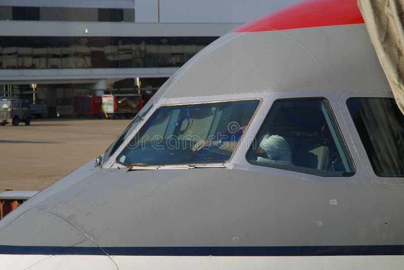 Pilot Working on Pre-flight Editorial Photo - Image of airliner ...