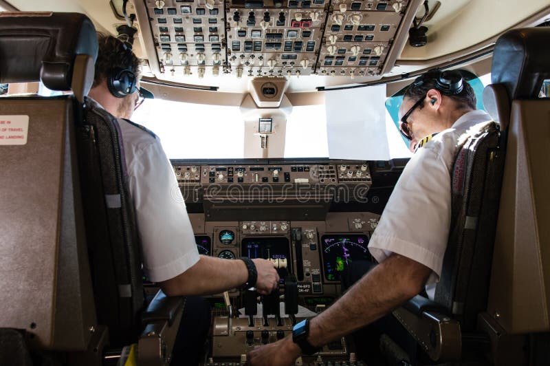 Pilots in Cockpit editorial photo. Image of crew, modern - 44066311