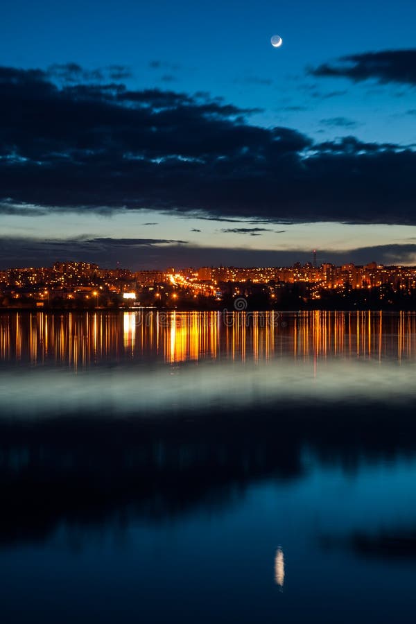 City Skyline with a Pond at Night Stock Photo - Image of clouds, europe ...