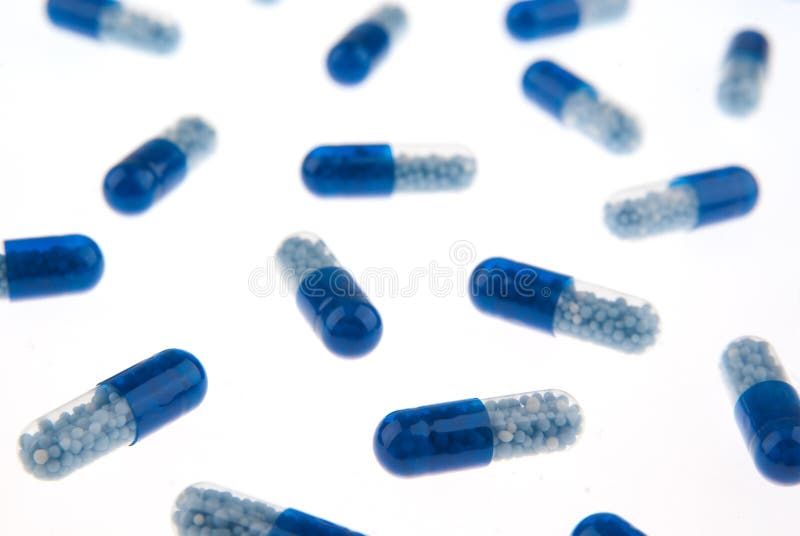 Pillule Bleu-et-blanche photo stock. Image du macro, prescription ...