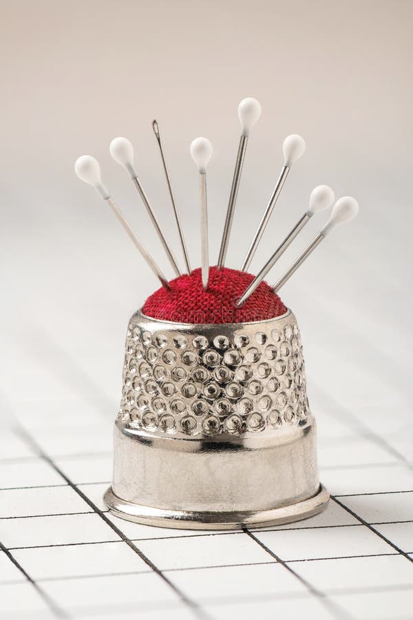 Pin Cushion Stylized Like Thimble with Pins and Needle, Macro Stock ...